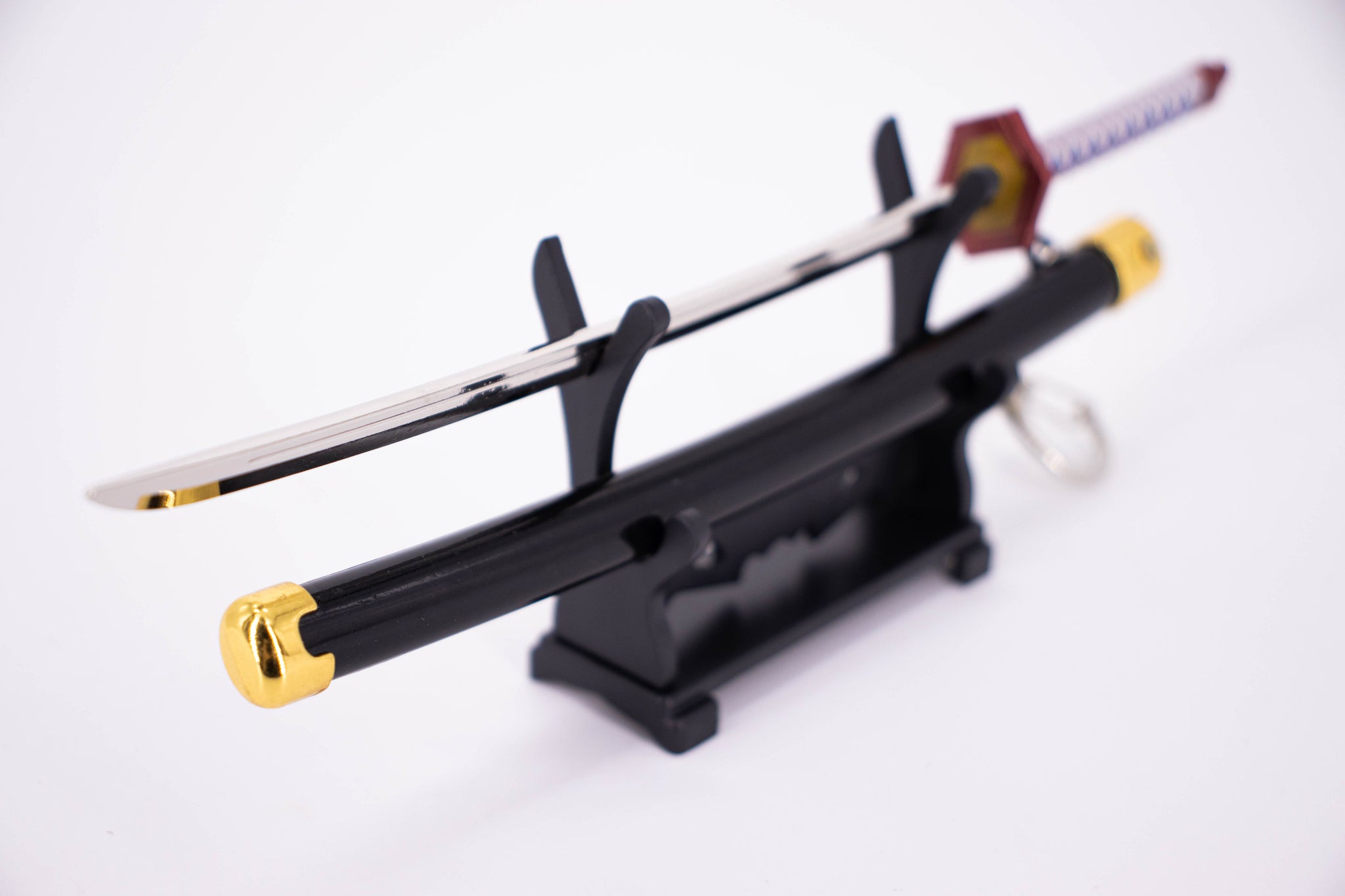 DEMON SLAYER – GIYU TOMIOKA’S NICHIRIN SWORD KEYCHAIN – FF COLLECTIBLES