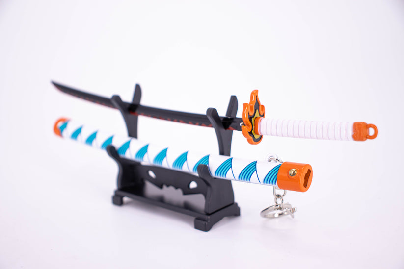 DEMON SLAYER – KYOJURO RENGOKU’S NICHIRIN SWORD KEYCHAIN – FF COLLECTIBLES