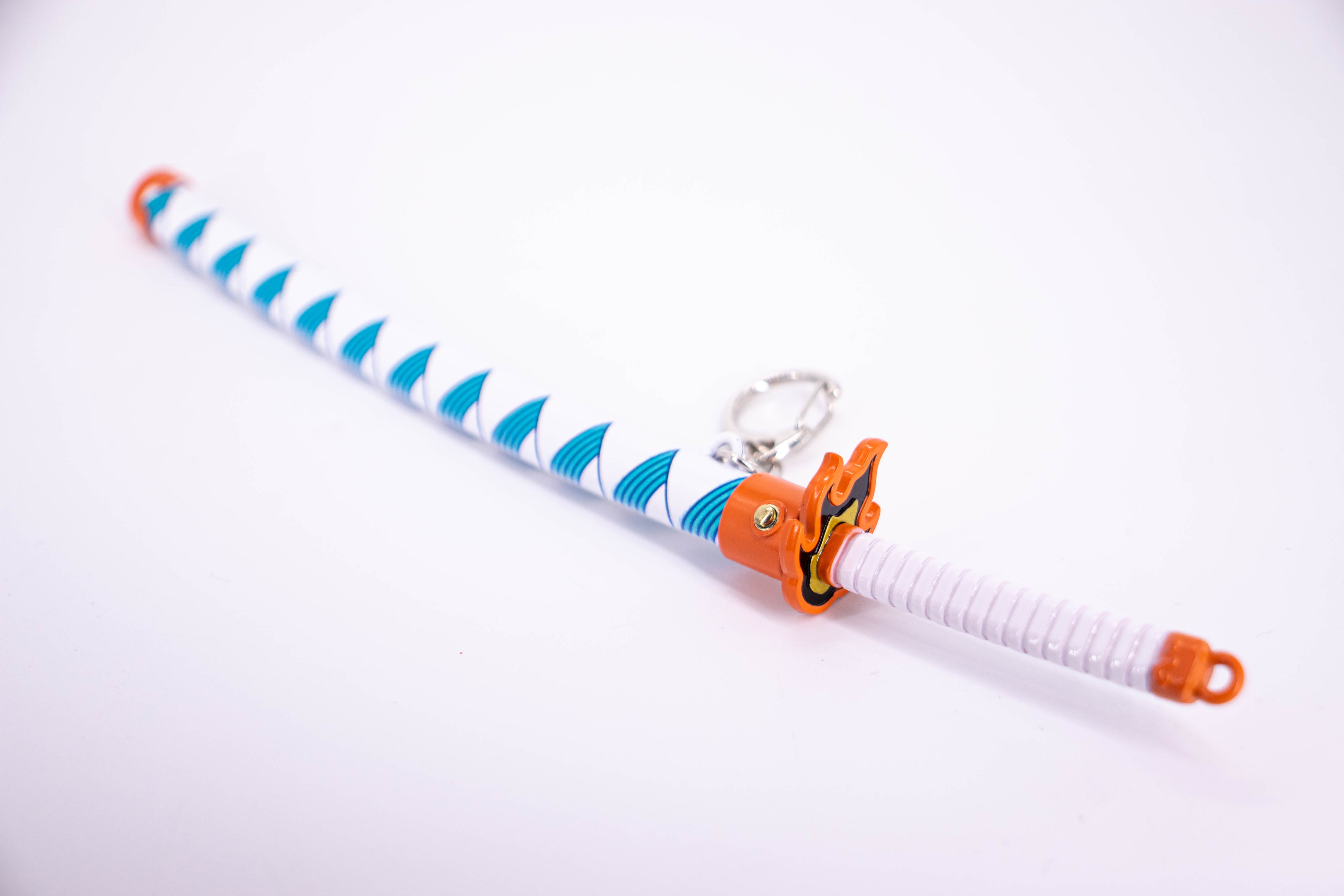 DEMON SLAYER – KYOJURO RENGOKU’S NICHIRIN SWORD KEYCHAIN – FF COLLECTIBLES