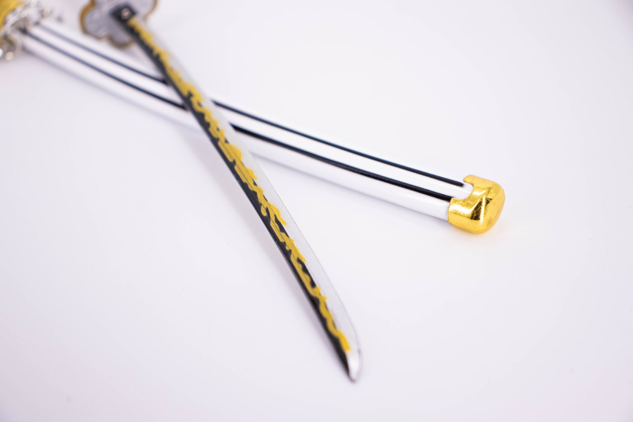 DEMON SLAYER – ZENITSU AGATSUMA’S NICHIRIN SWORD KEYCHAIN – FF COLLECTIBLES